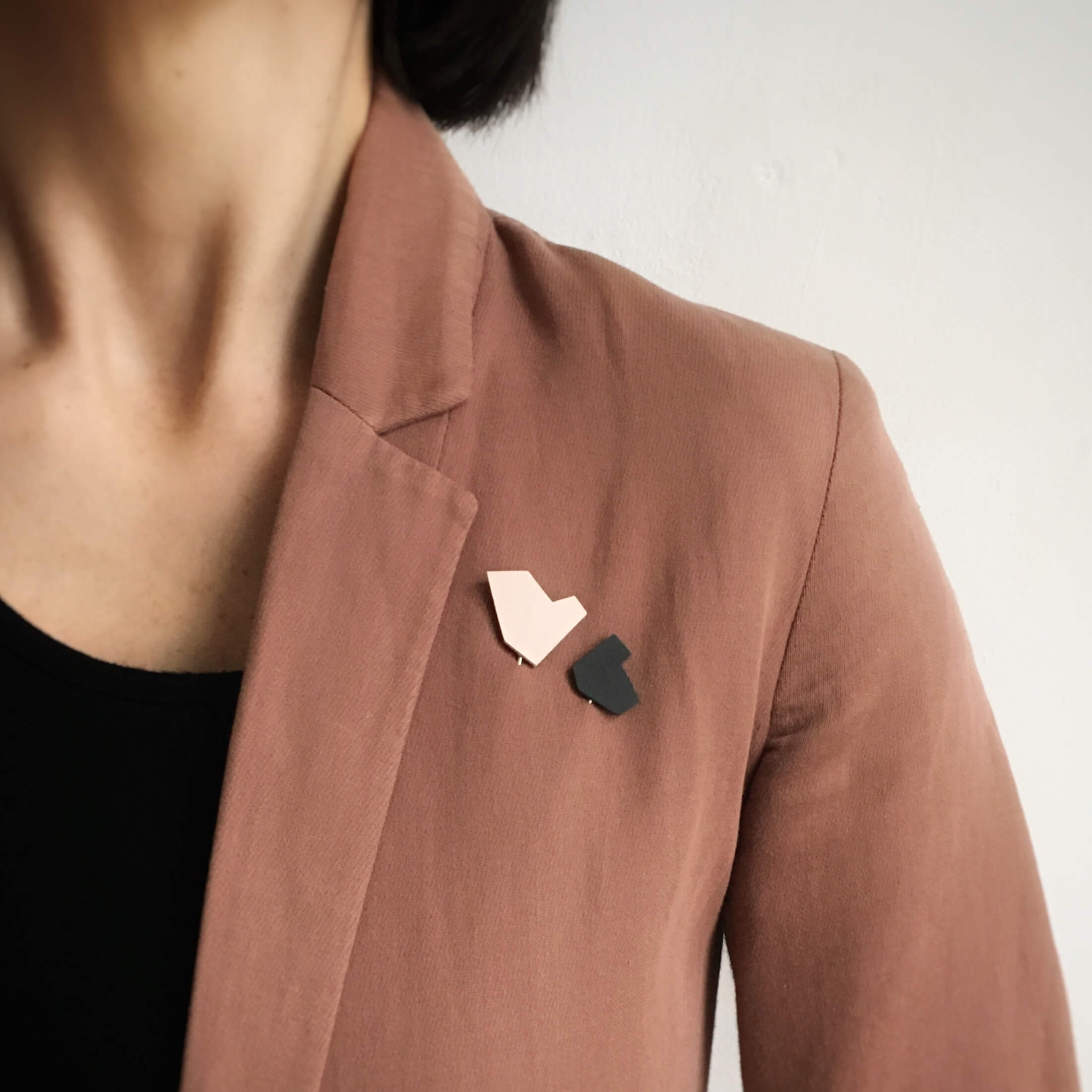 Black and pink heart pins • Jagged Squares