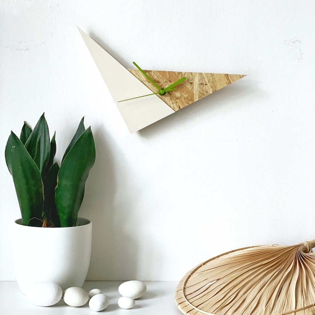 White overlapping triangles wall clock with green hands • Jagged Squares